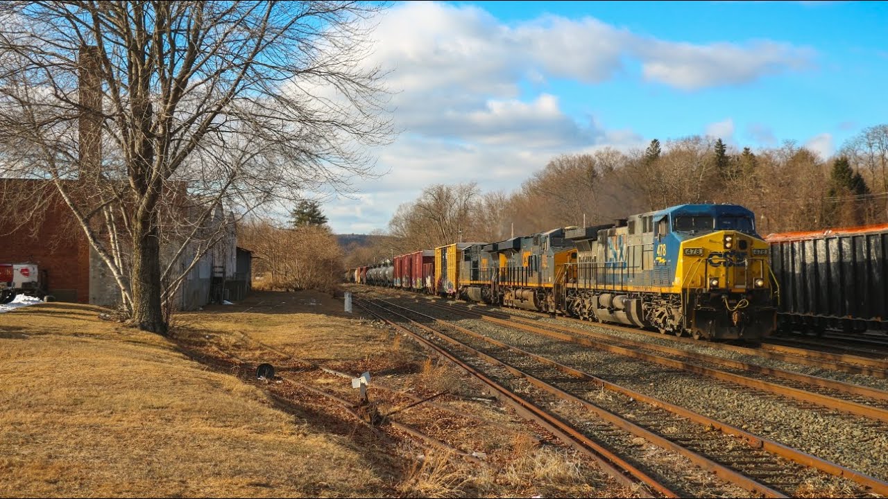 CSX M426 and Amtrak P448 with a phase 7 locomotive AMTK 9702 - YouTube