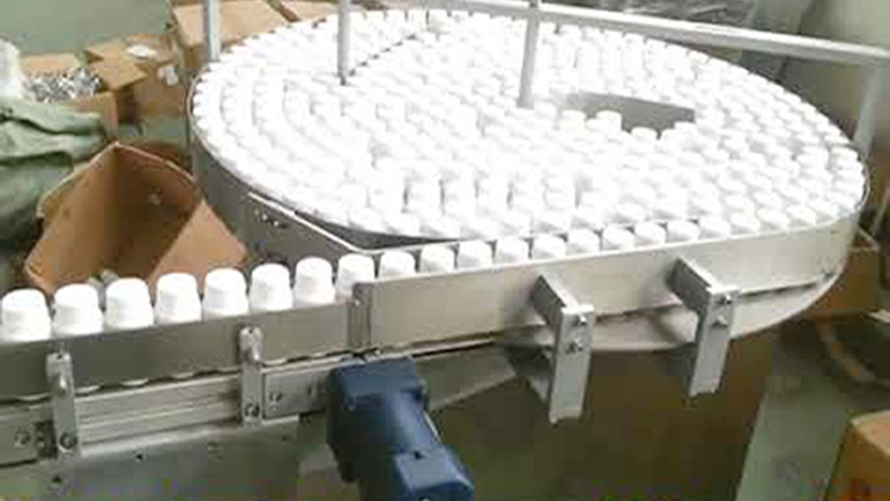 bottles cartoning boxing machine with feeding turntable - YouTube