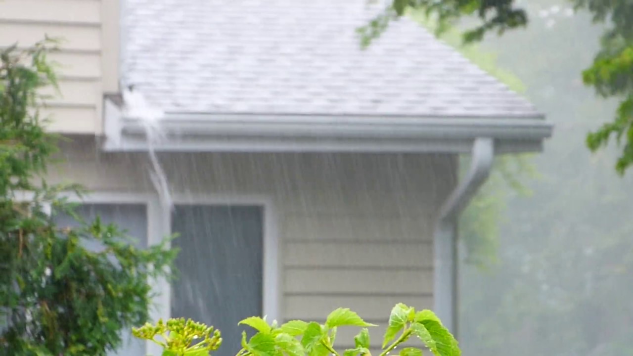 Water shooting over gutter 1618 Hanover Court - YouTube