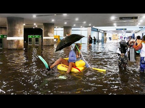 Cooling off? Swedes turn flooded station into swimming pool - YouTube