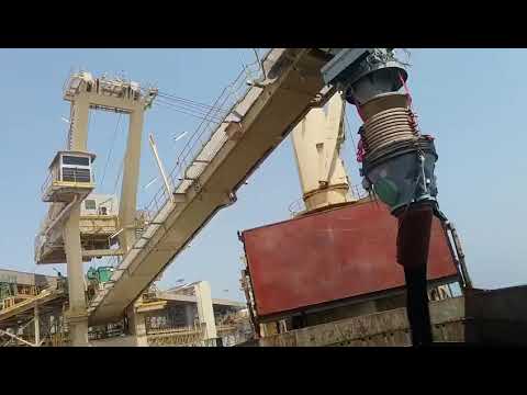 Commissioning of Ship loader loading fertilizer into ship hatch.