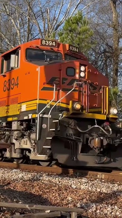 BNSF 8394 ES44C4 gives a horn salute at it leads an intermodal train south on the CSX A & WP sub ...