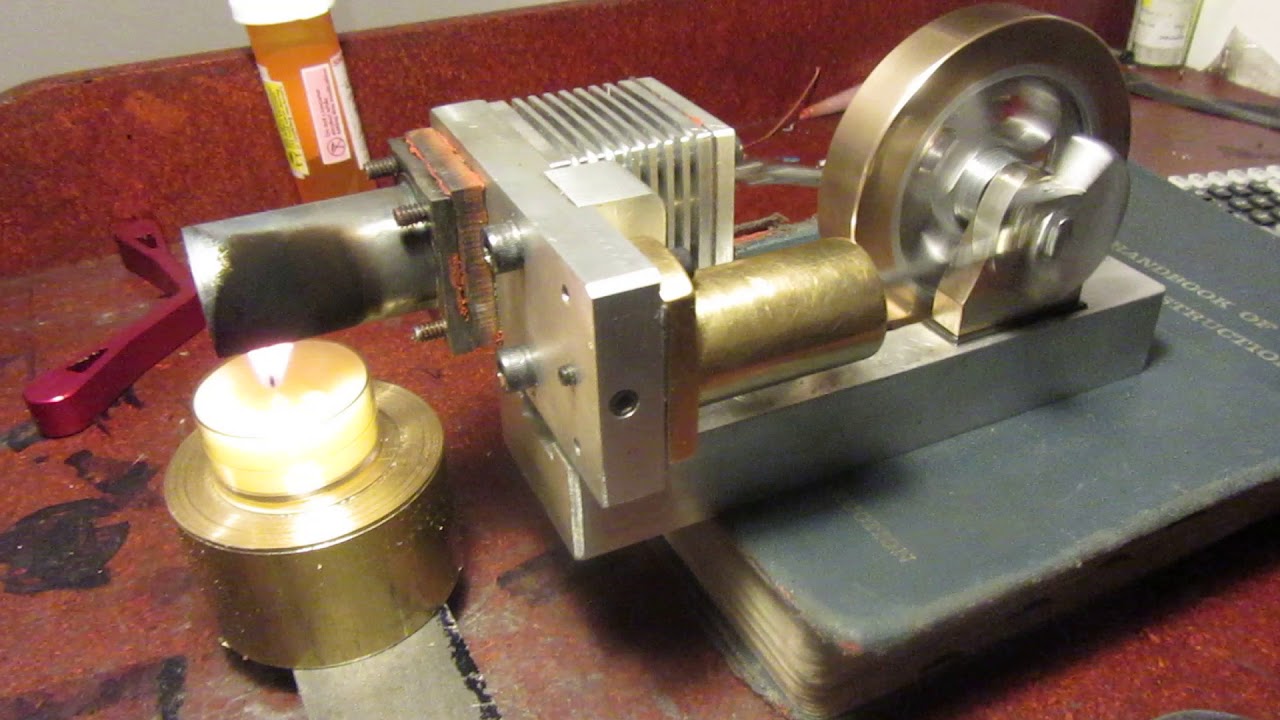 BRIANS STIRLING ENGINE RUNNING ON TEA CANDLE - YouTube