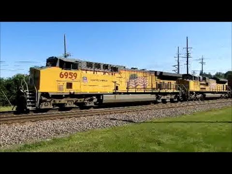 UP 6959 and UP 8733 lead a stack train west through Geneva IL - YouTube