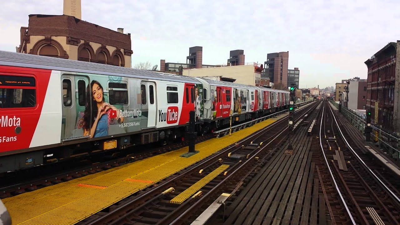 R160 J train with YouTube ad wrap. - YouTube