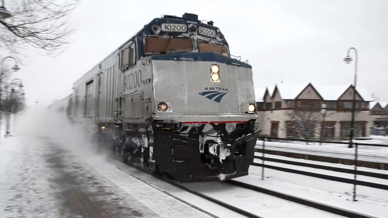 Amtrak, Metra, and CP in winter snow - YouTube