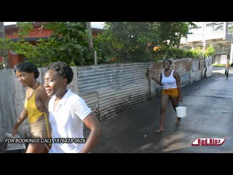 GIRLS WETING UP GIRLS WITH WATER IN JAMAICA