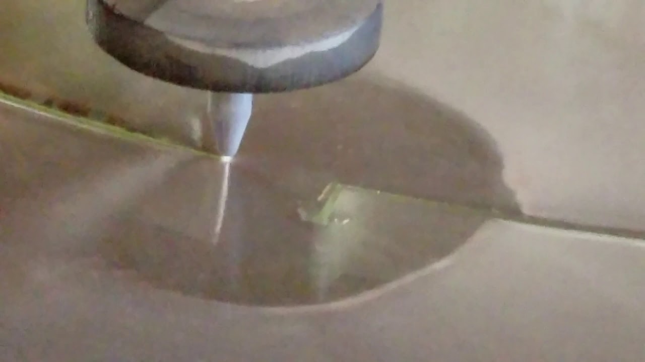 Water jet cutting 33" mirror video #10. - YouTube