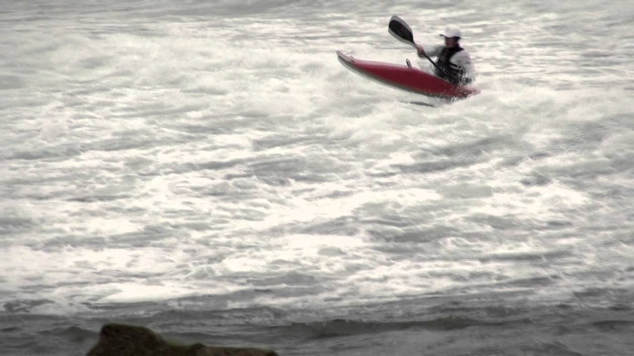 Paddling out through the surf - YouTube