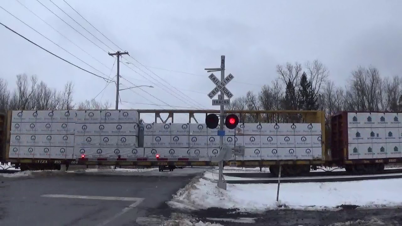 CSX train crosses railway crossing - YouTube