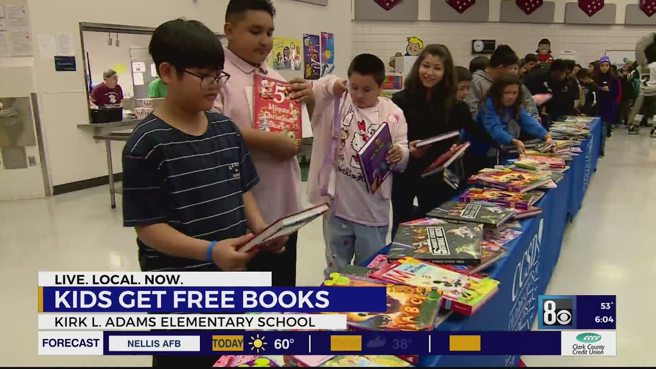 Children receive free books at local elmentary school - YouTube