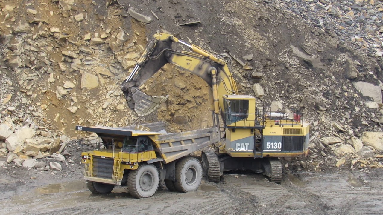 Cat 5130 loading 777s - YouTube