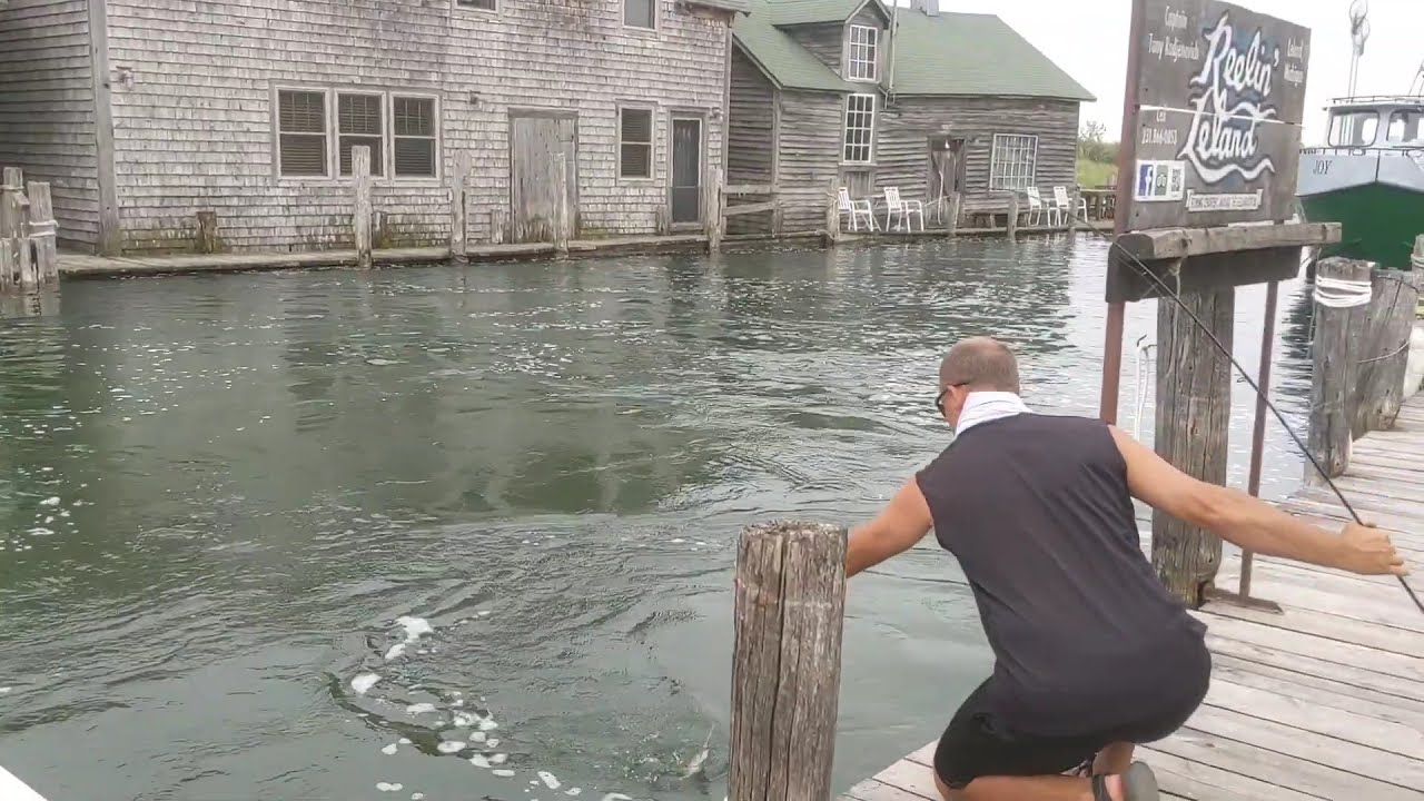 Catching A Fish in Historic Fishtown - Leland Michigan - YouTube