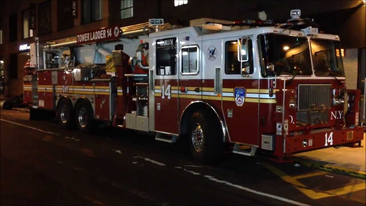 CLOSE UP VIEW OF THE BRAND NEW FDNY TOWER LADDER 14, ACTING FDNY LADDER ...