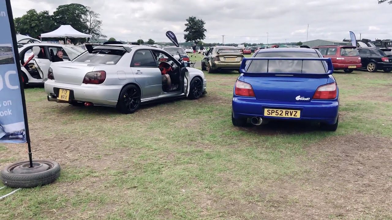Subaru duo creates a crowd at car show - YouTube