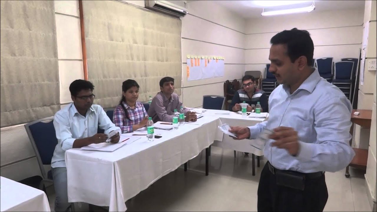 Amit Kulkarni conducting Planning Poker Estimation Exercise - YouTube