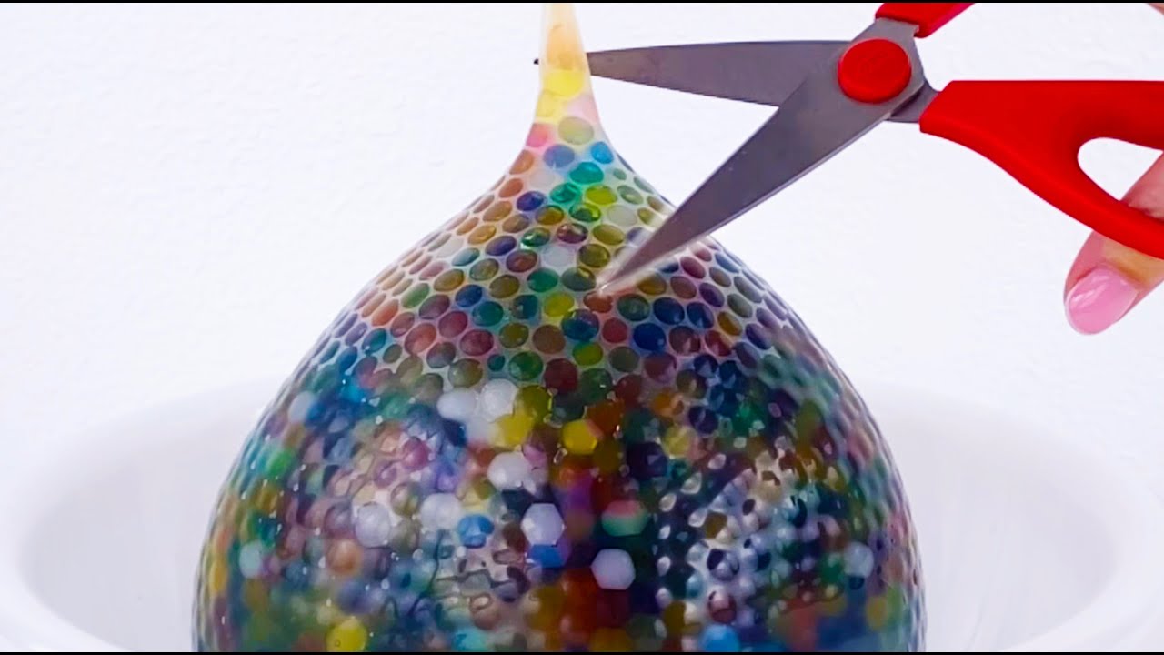 Amazing experiment orbeez colorful water beads in ballon / Slow motion ...