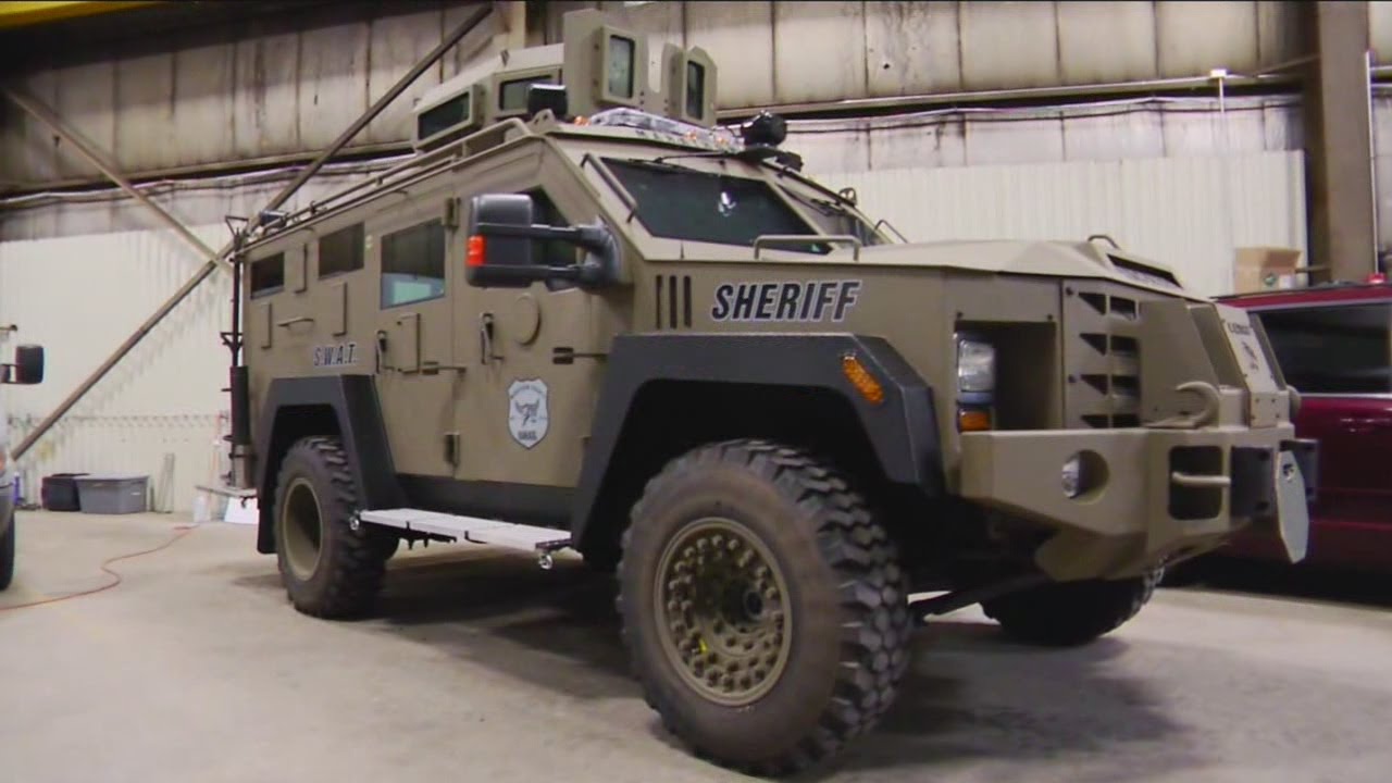 Small town police gear up with big armor - YouTube