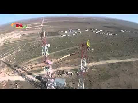 Kurdish fighters fly 250ft 'flag of victory' on hill over Kobane as ...