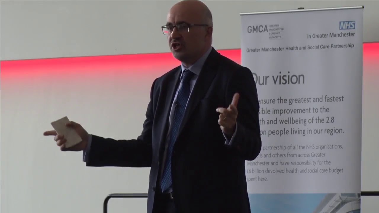 Jon Rouse, Chief Officer at GMHSC Partnership, speaking at the GM ...