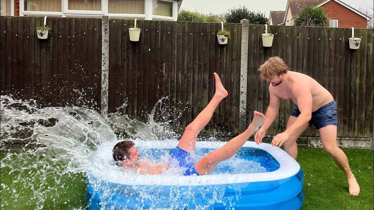 Ice cold swimming pool wrestling match dad vs uncle Charlie - YouTube