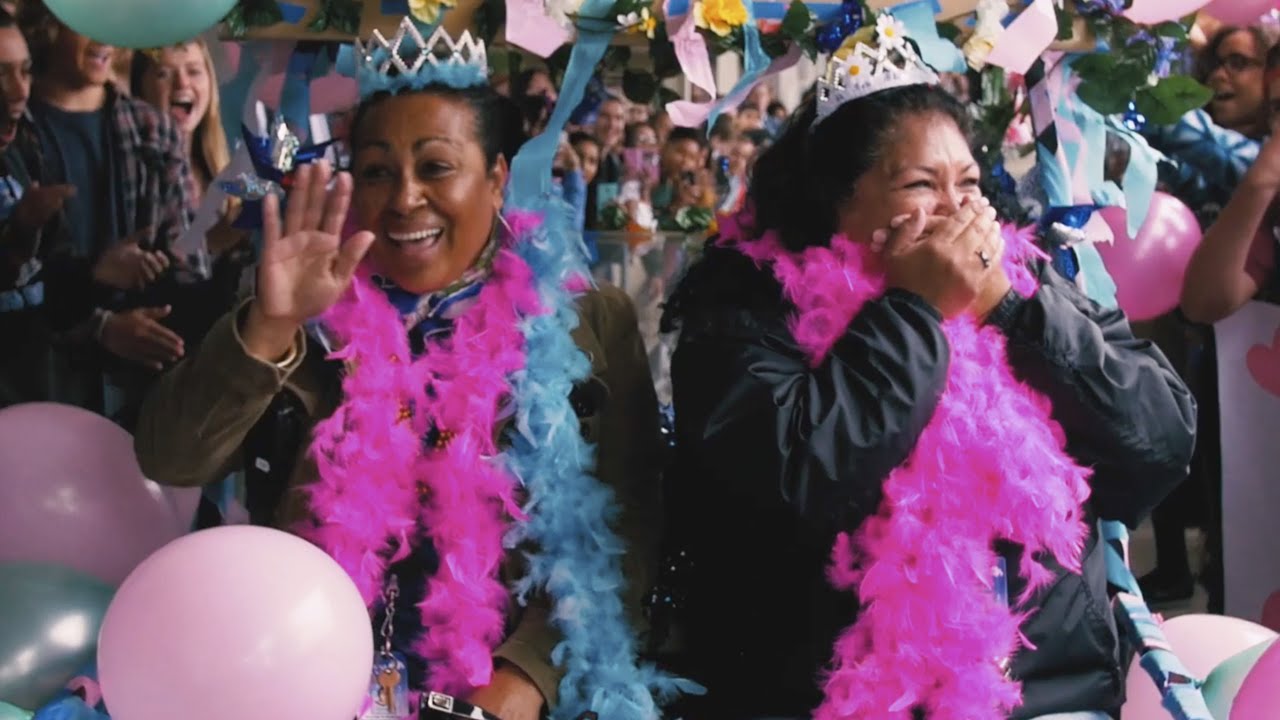 School's favorite security guards overwhelmed with pop-up parade! - YouTube