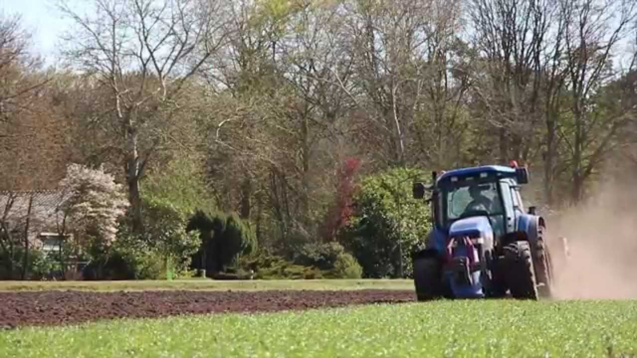 New Holland TM120 - YouTube