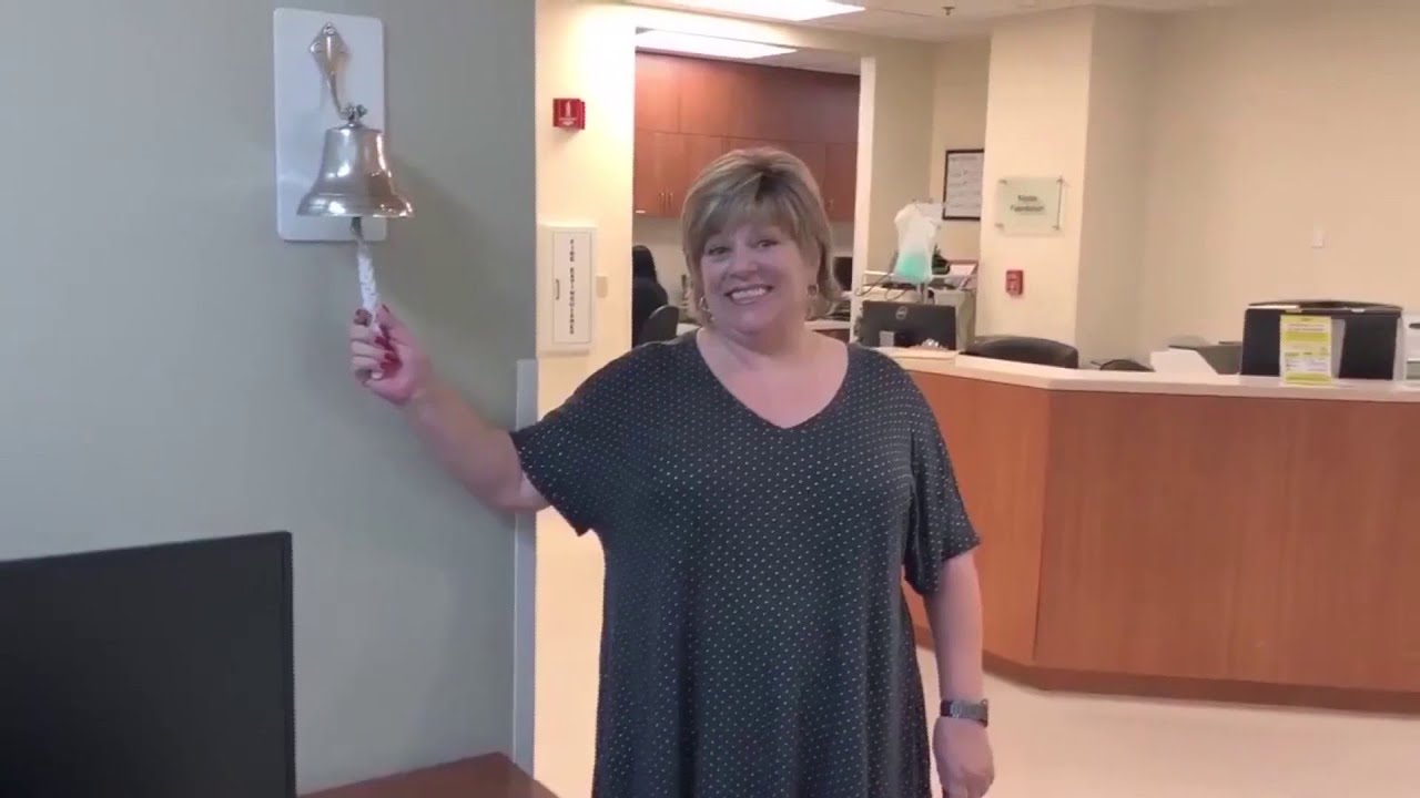 Woman rings 'cancer free' bell so hard it breaks - YouTube