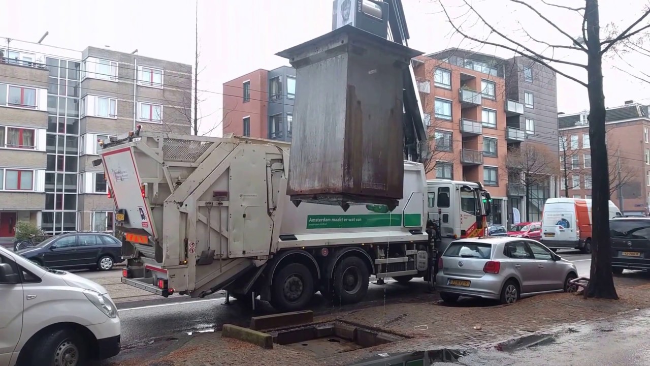 Garbage truck in Amsterdam using a crane - YouTube