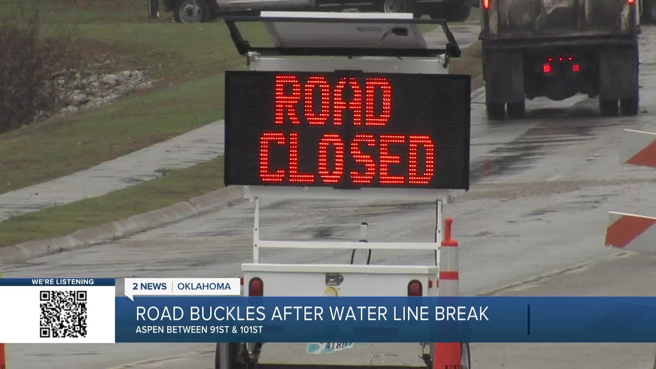 Road buckles after Broken Arrow water line break - YouTube