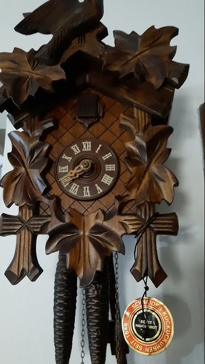 how to set a cuckoo clock - YouTube