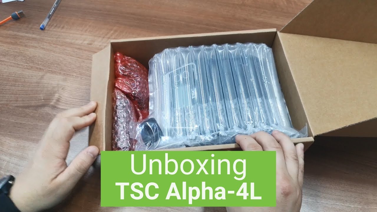 Unboxing imprimanta mobila de etichete TSC Alpha-4L - YouTube