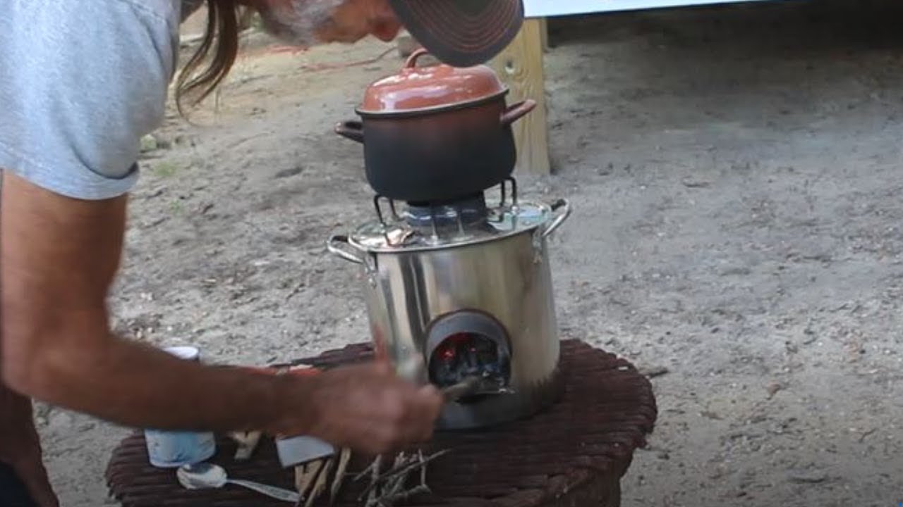 Using STICKS to Cook on a ROCKET STOVE! - YouTube