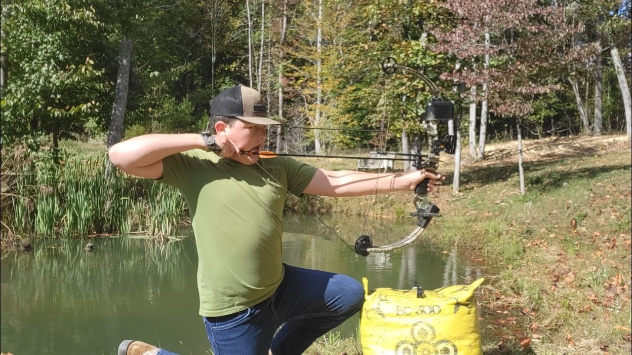 Practice bow shooting across a pond - YouTube