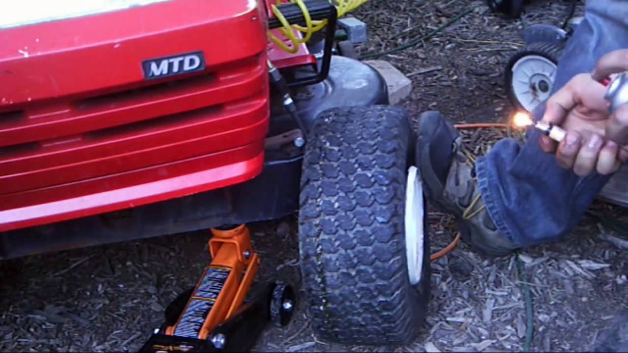 how to put a tubless tire a back on the rim - YouTube