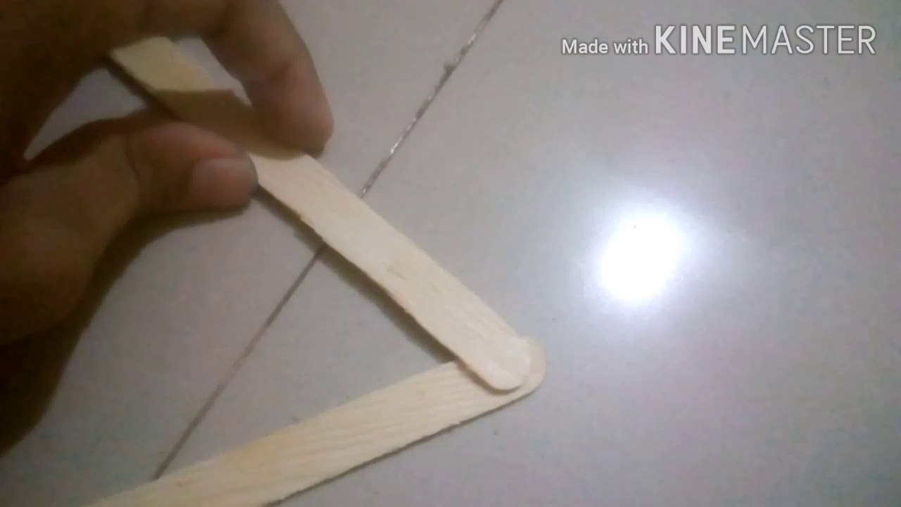 How to make catapult game with ice cream stick - YouTube
