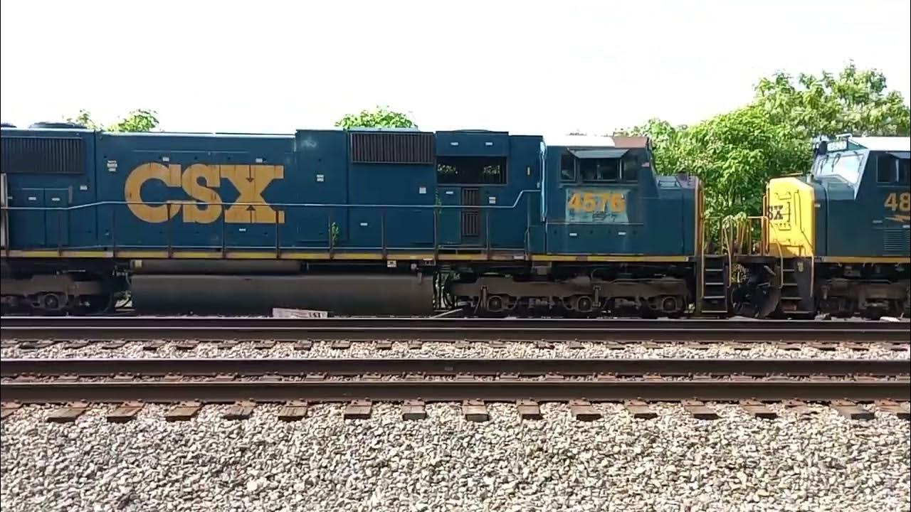 Walking along side stored locomotives with CSX 4500 Spirit of Cumberland, YN2 SD40-2 8824 and ...