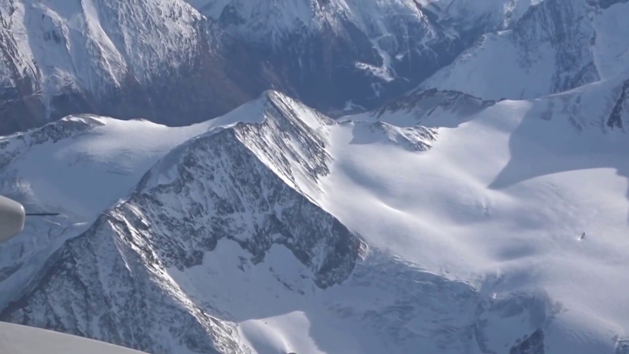 Flying over the Swiss Alps - YouTube