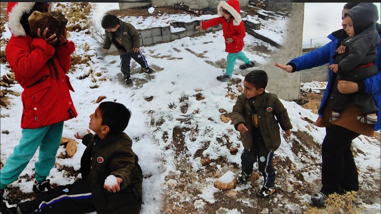 Children playing in the snow in the cold; coping with the cold and ...