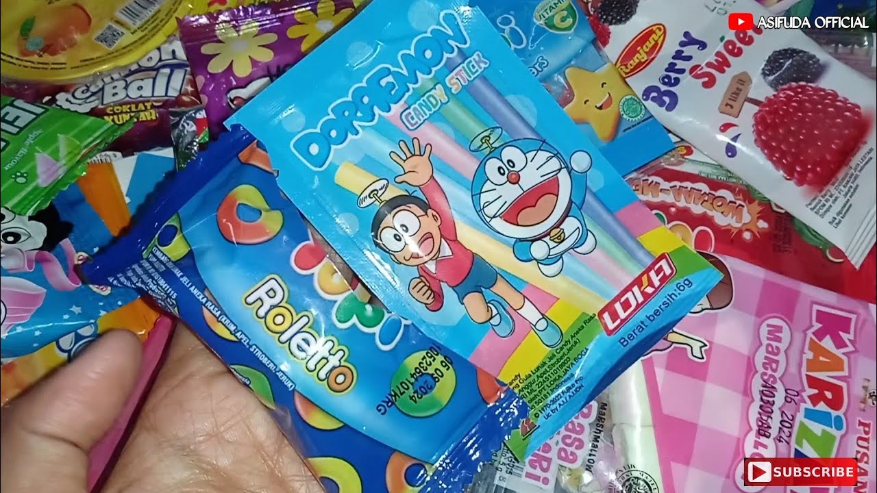Unboxing YUPI Roletto, DORAEMON Candy Stick 🍭🐱🍎🍊🍏 - YouTube