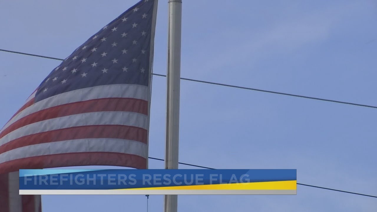 Firefighters save American flag from flames in two-alarm fire - YouTube