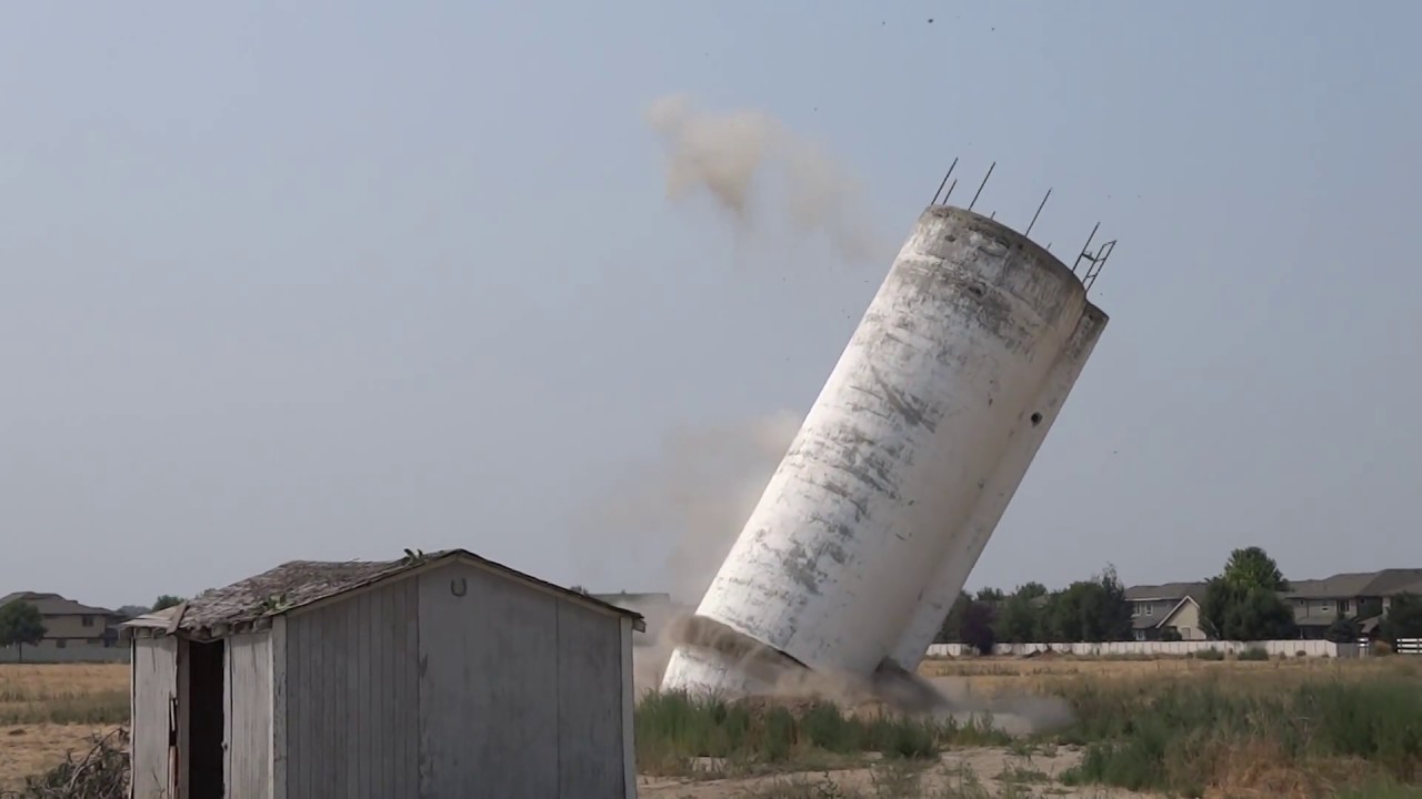 Demolition of a concrete silo - YouTube