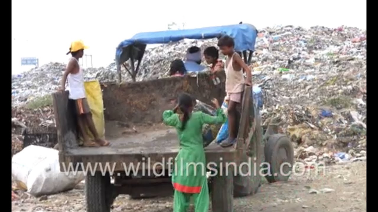 Children with adults ragpicking at a garbage dump site - Children ...