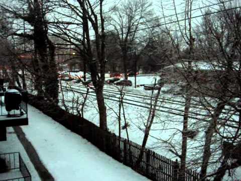 2 regional rail trains with pantograph arcing during ice storm - YouTube