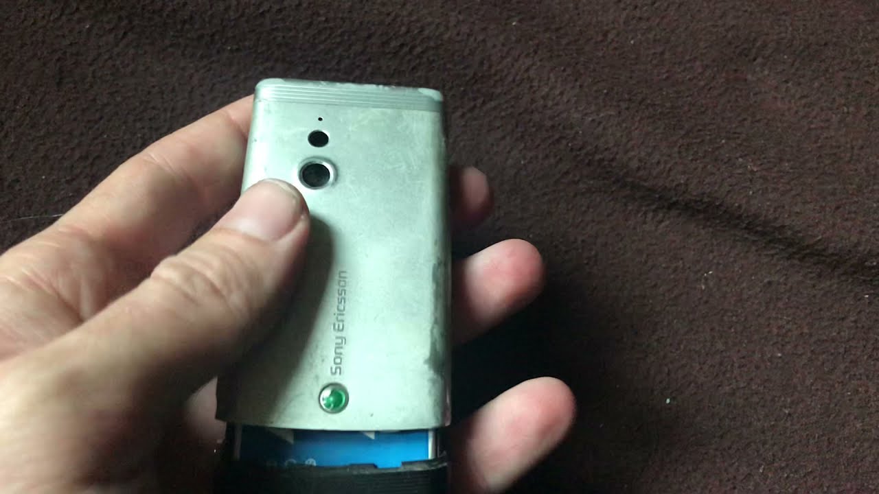How to change battery in Sony Ericsson J10i2 - YouTube