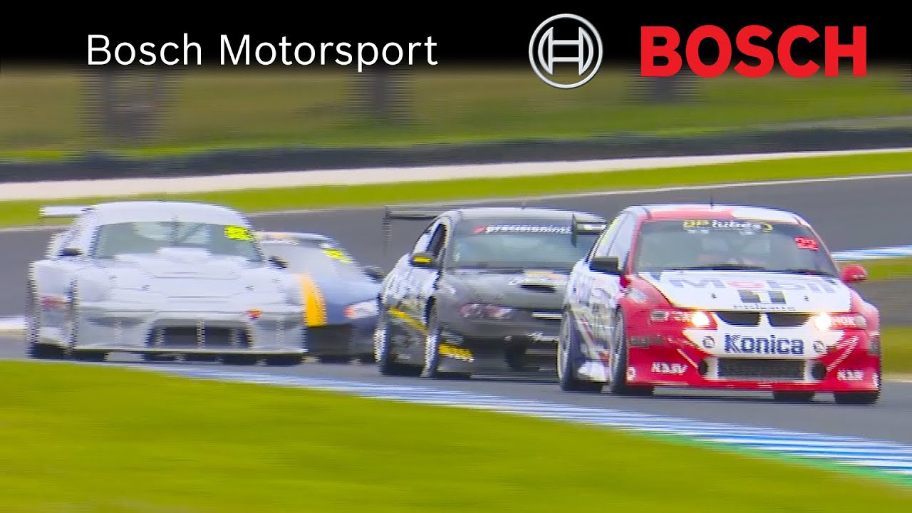 Awesome V8 Monaro Fights Through Pack - YouTube