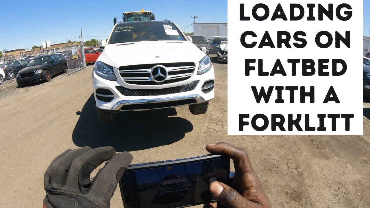 Loading cars onto a Flatbed with forklifts | Auto Transport Car Hauling ...