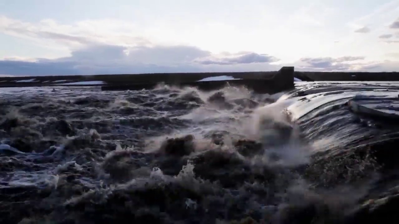 Chunks of Ice Flow Through Dam on Swollen Little Sioux River - YouTube