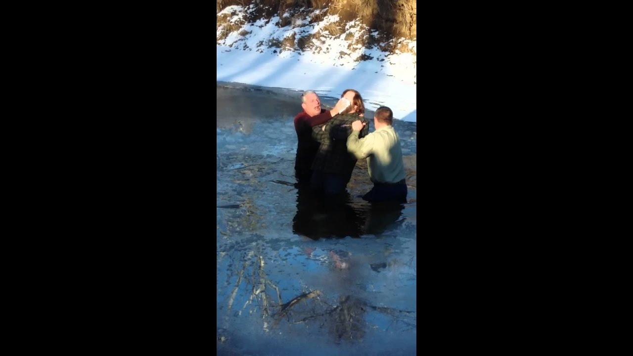 Baptism in the ice - YouTube