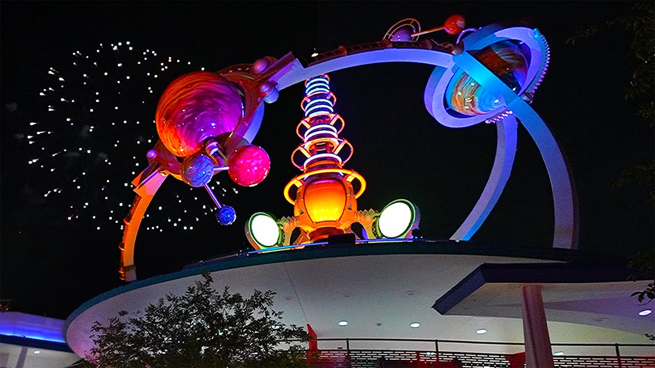 Astro Orbiter during Fireworks - Walt Disney World Ride at Night [4K ...